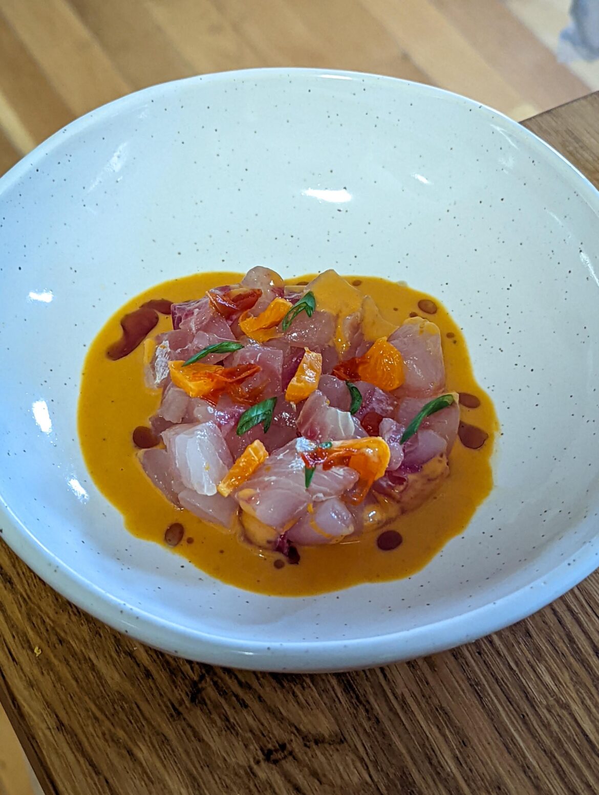 Citrus cured snapper with tangerine, fermented scotch bonnets, scallion ...