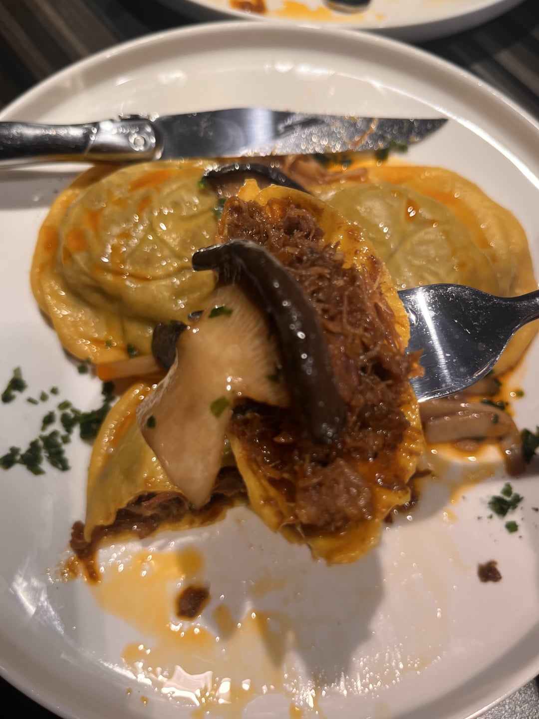 braised short rib ravioli sautéed in truffle butter and king oyster ...