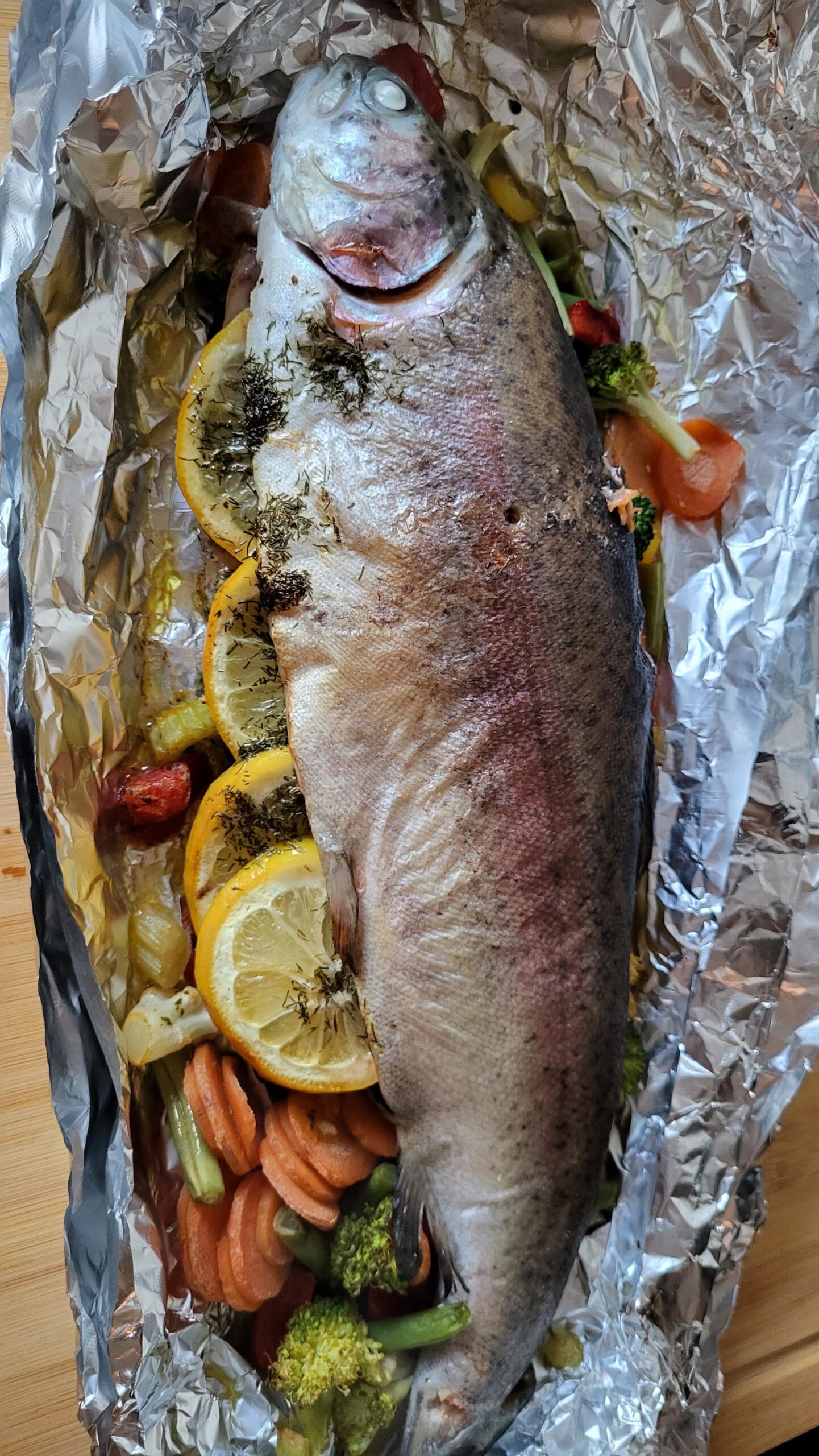 Salmon trout filled with herb butter and lemon - Dining and Cooking