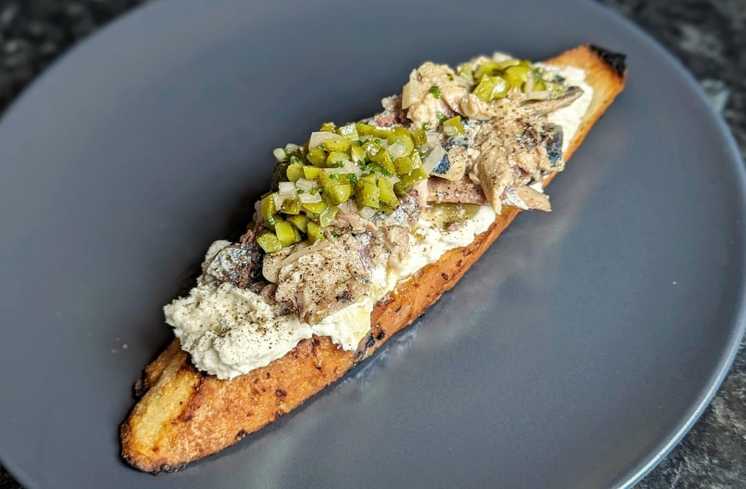 Cornish pilchards and horseradish on toast with very nice can art ...