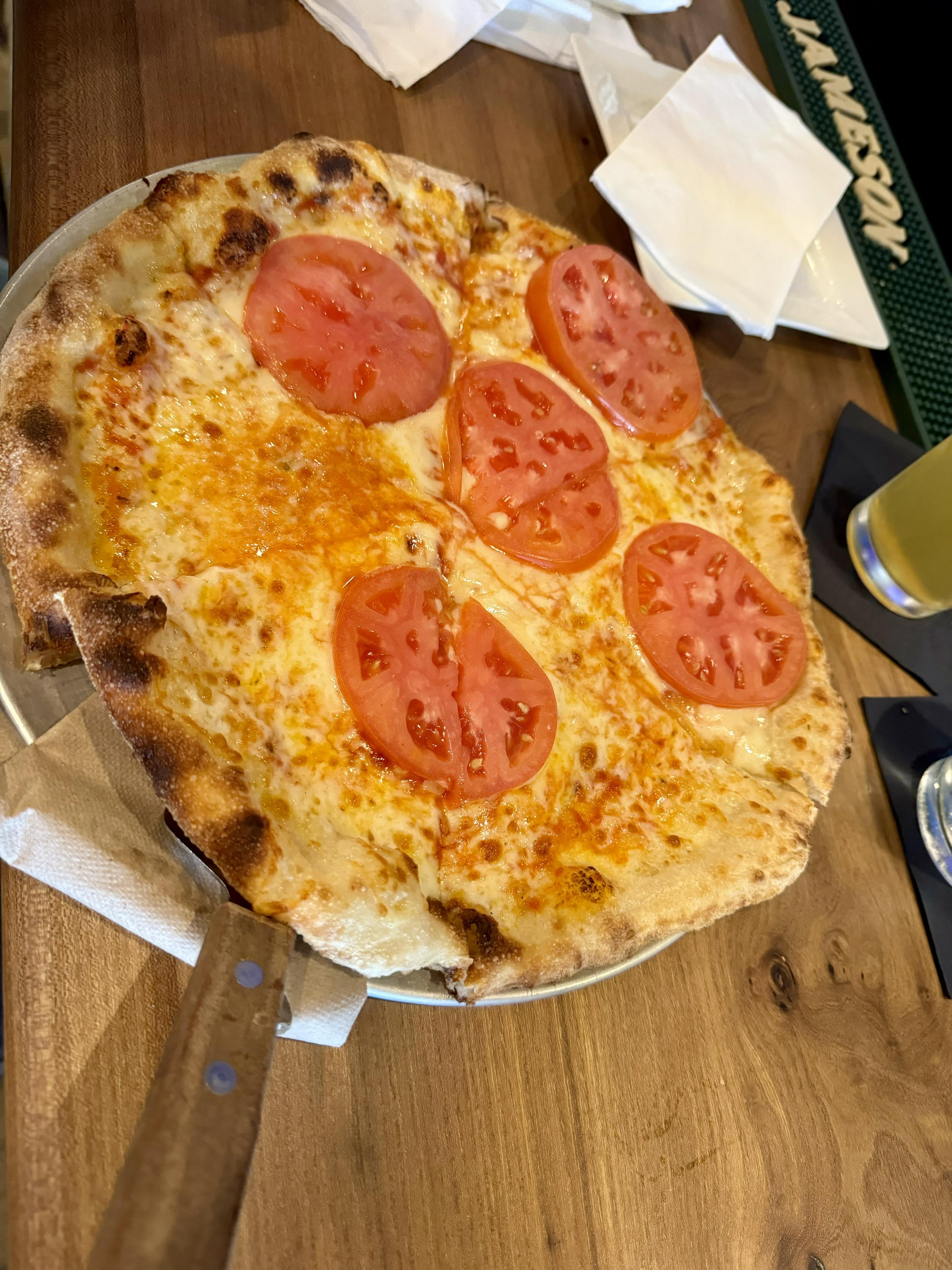 First time pizza from this place. Cheese pizza with added sliced ...