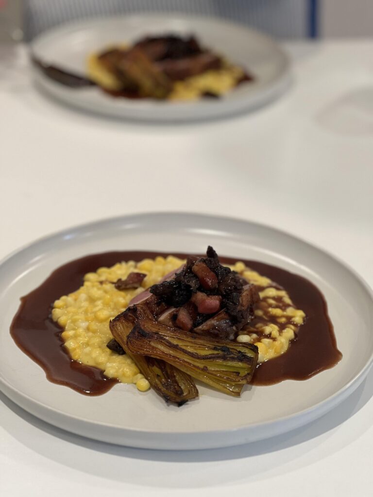 Duck breast with corn, duck Demi, morels, pancetta and braised leeks ...