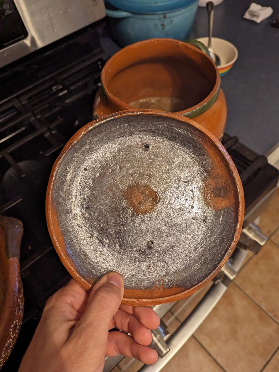 Mexican clay pot turning grey - Dining and Cooking