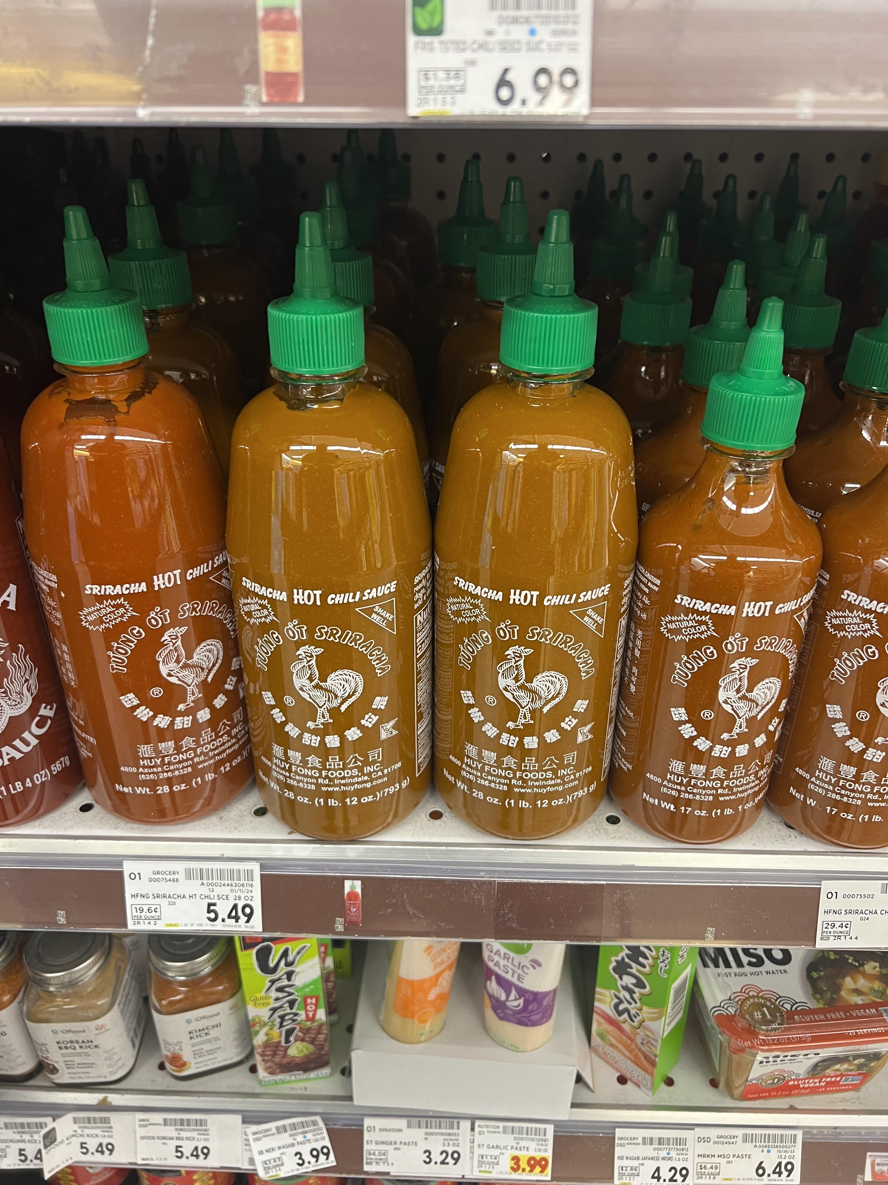 I know Sriracha had to chance their formula, but the new color looks ...