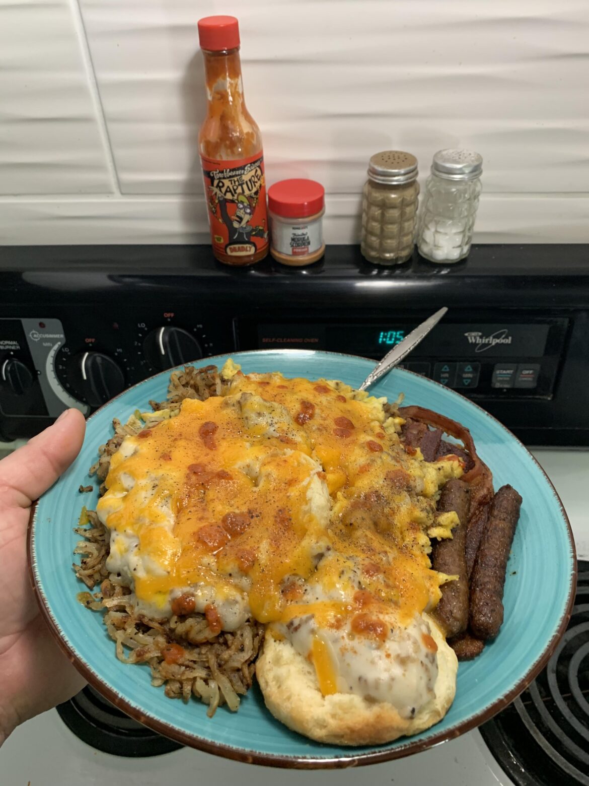 Biscuits and gravy, dry scrambled eggs, hashbrowns, sausage, bacon, and ...