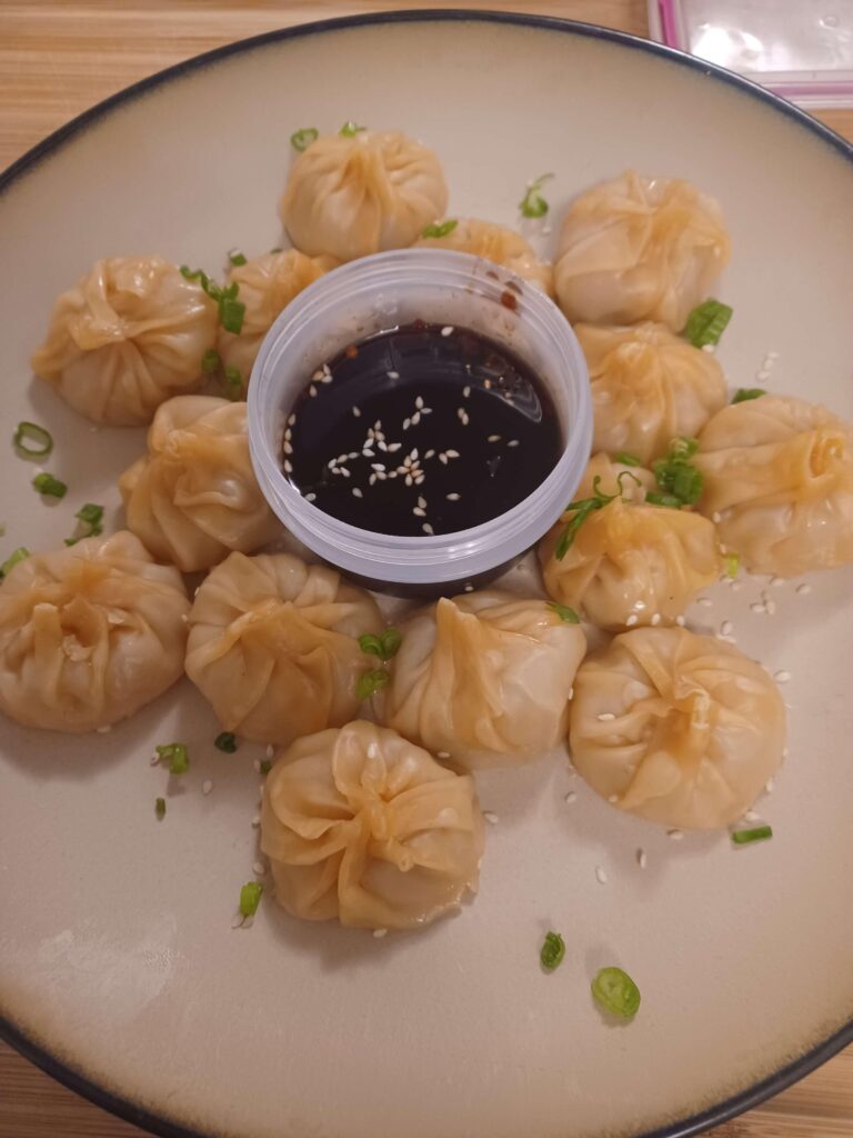 Homemade dumplings w/dumplings sauce, powered by winking owl Cabernet ...