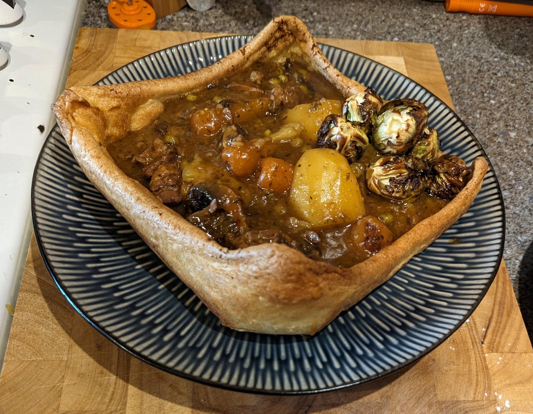 Made a beef and mushroom stew and served it in BIG Yorkshire puddings ...