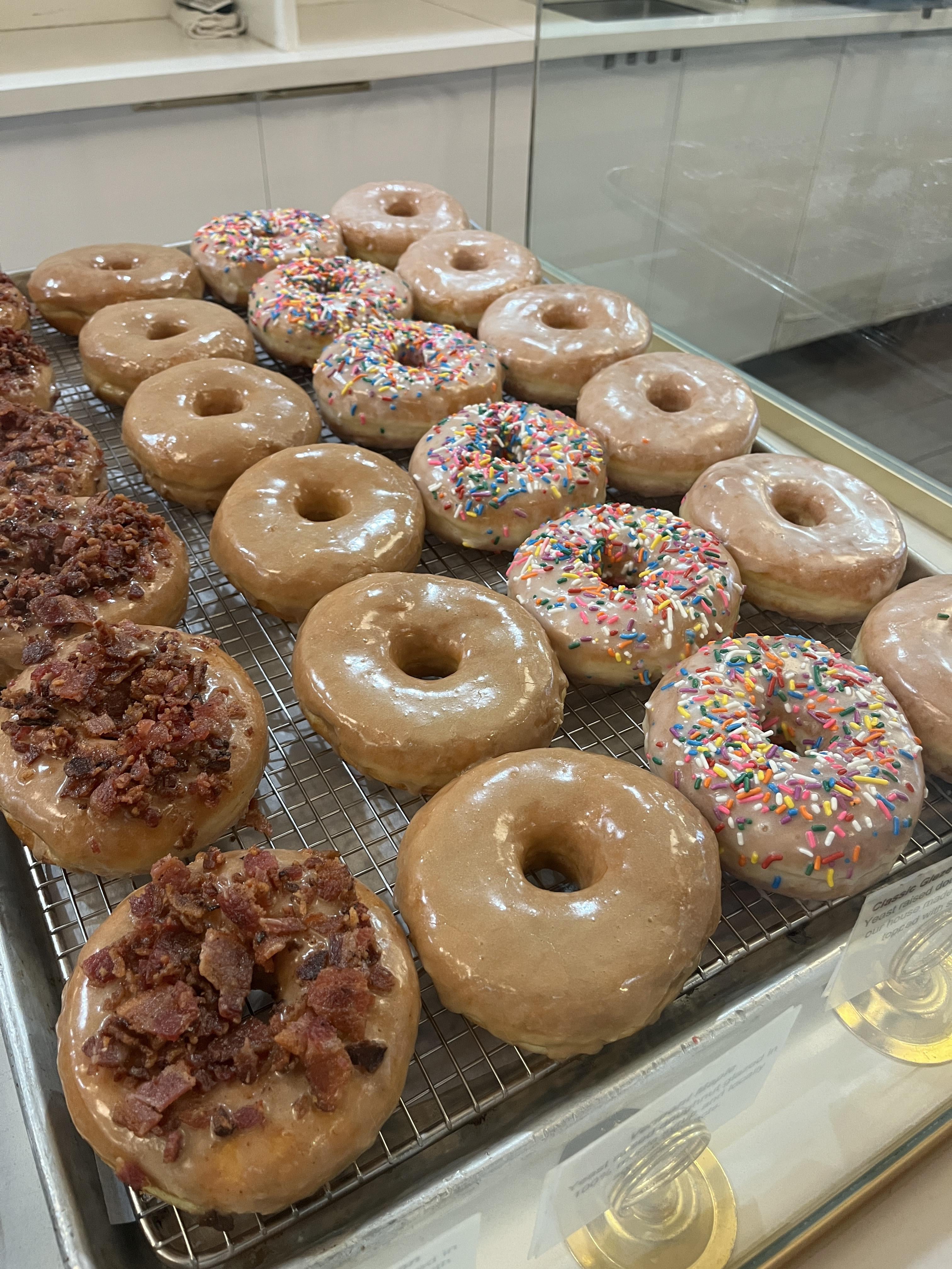 Tray of freshly glazed donuts. - Dining and Cooking