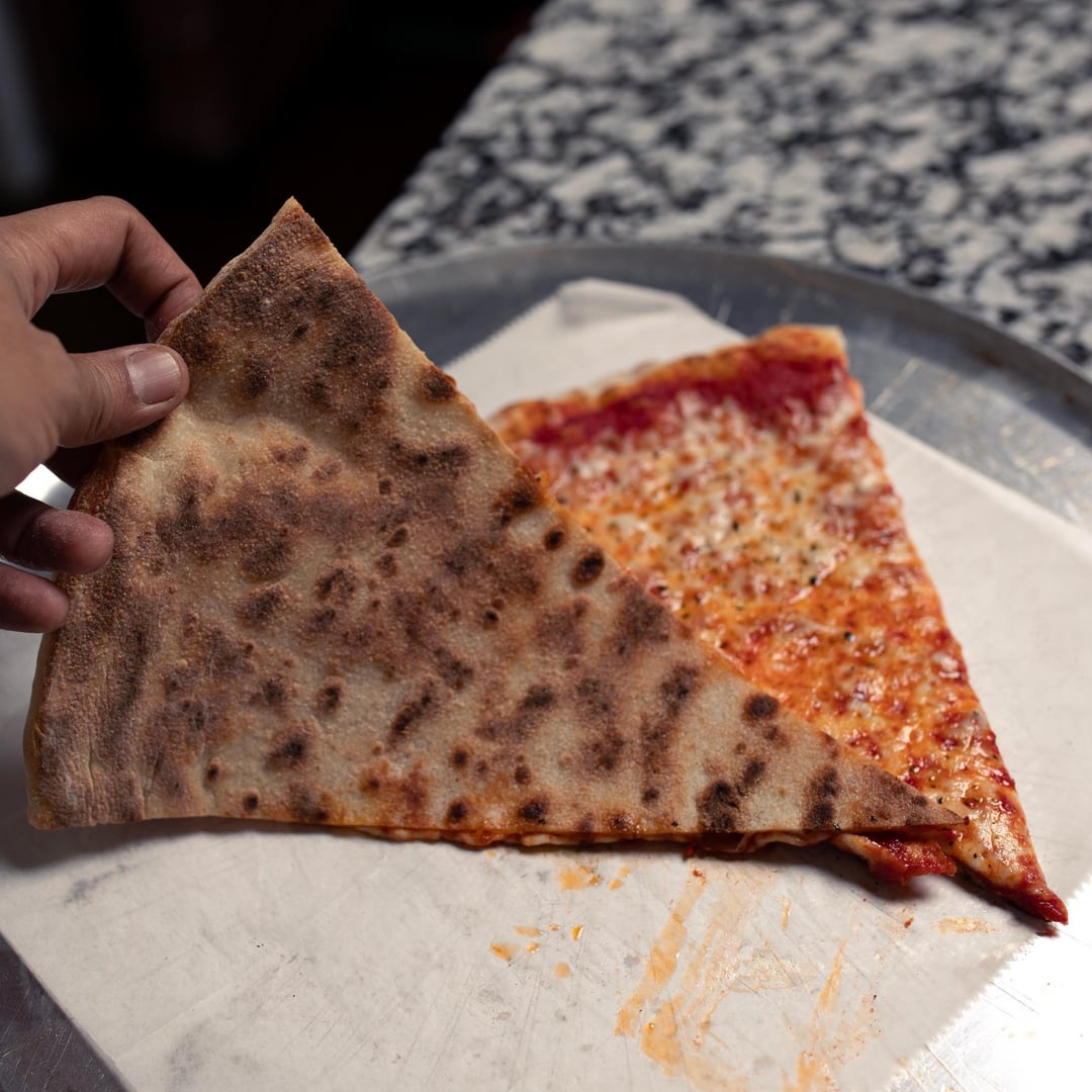 A couple plain slices from last night’s homemade cheese pizza. Say ...