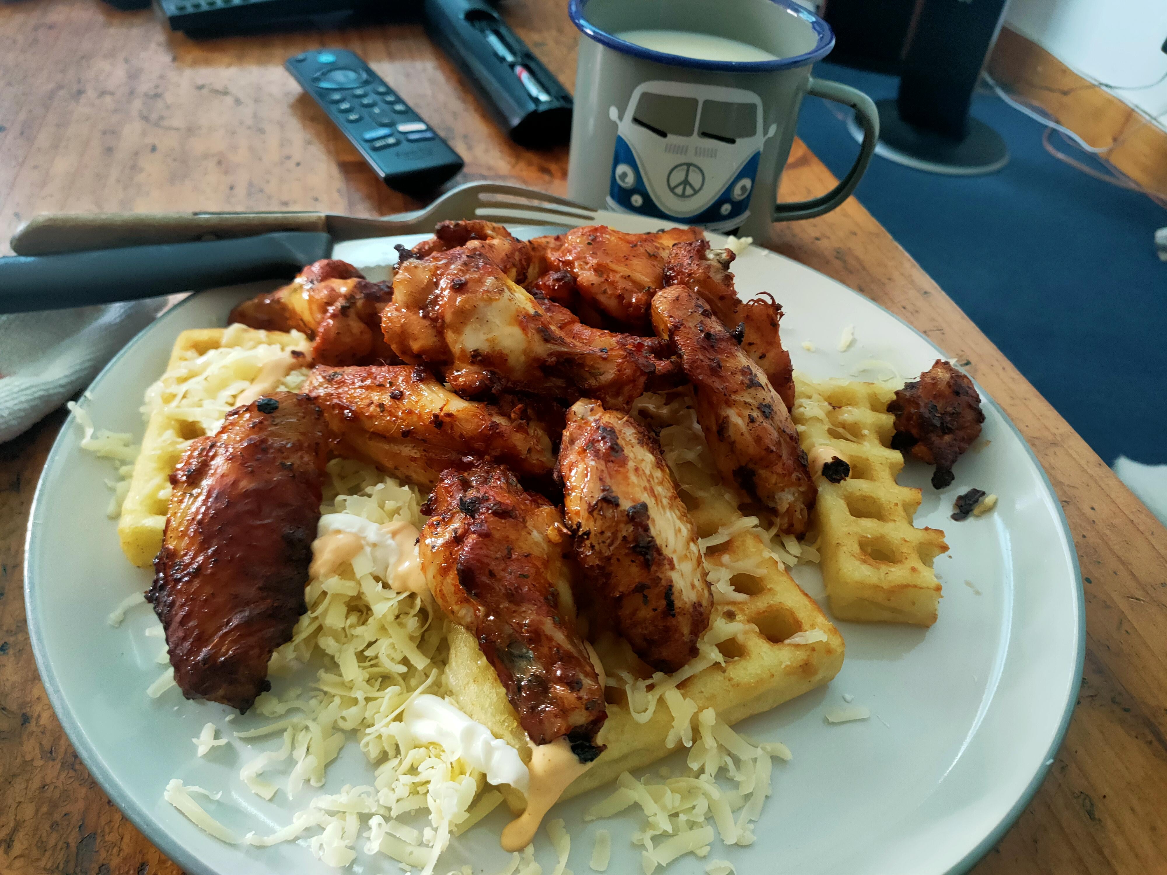 Wings on bed of waffles n cheese. - Dining and Cooking