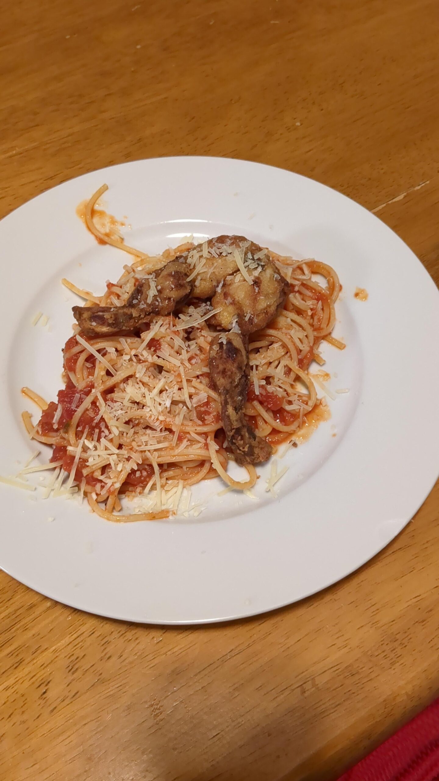 Fried frog legs on top of spaghetti - Dining and Cooking