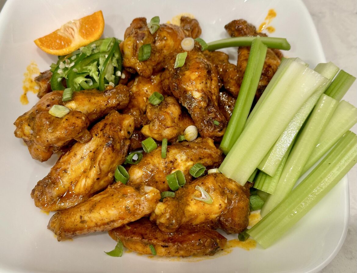 Smoked Jerk Wings spun in Trinidad Scorpion Buffalo sauce - Dining and ...