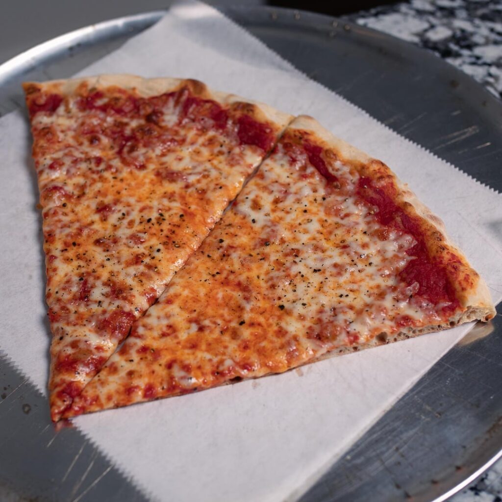 A couple plain slices from last night’s homemade cheese pizza. Say ...