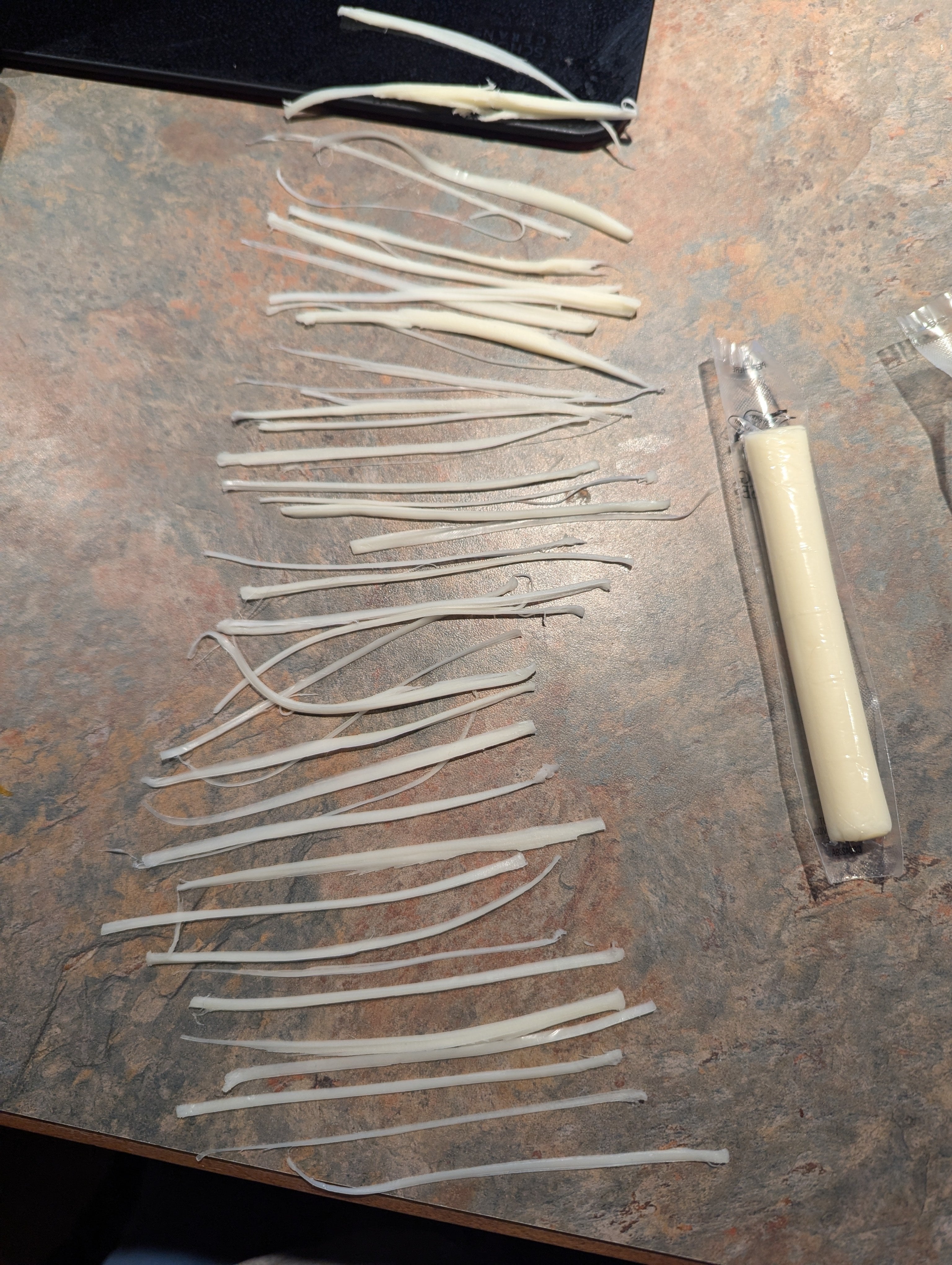 I managed to get 43 full length strings from one piece of string cheese ...