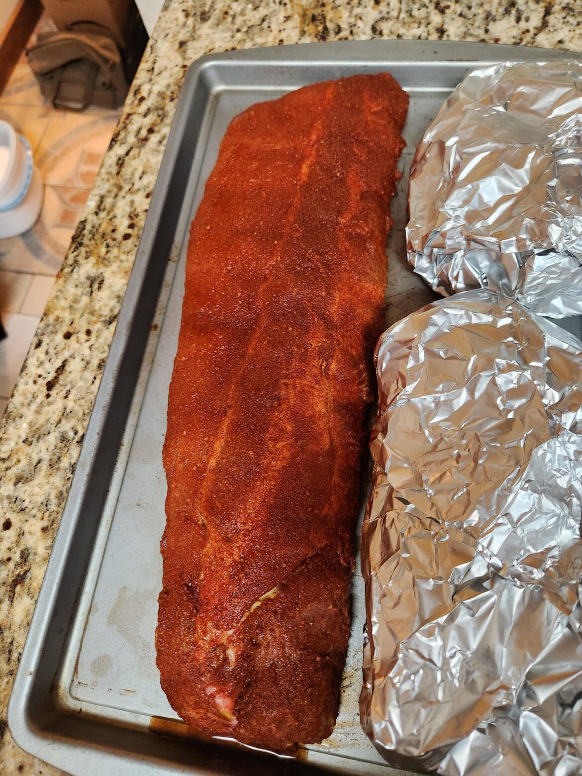 Killer Hogs BBQ rub on baby back ribs. - Dining and Cooking