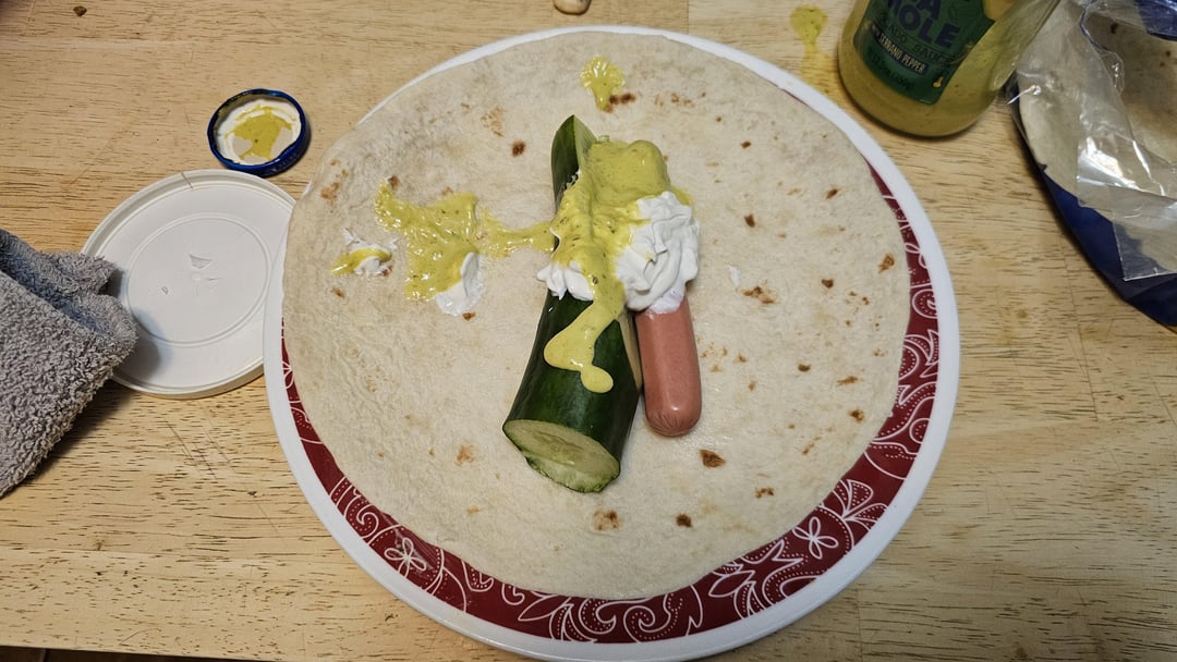 Here is a wrap I made. I took a pic mid-meal. I always eat what I make ...