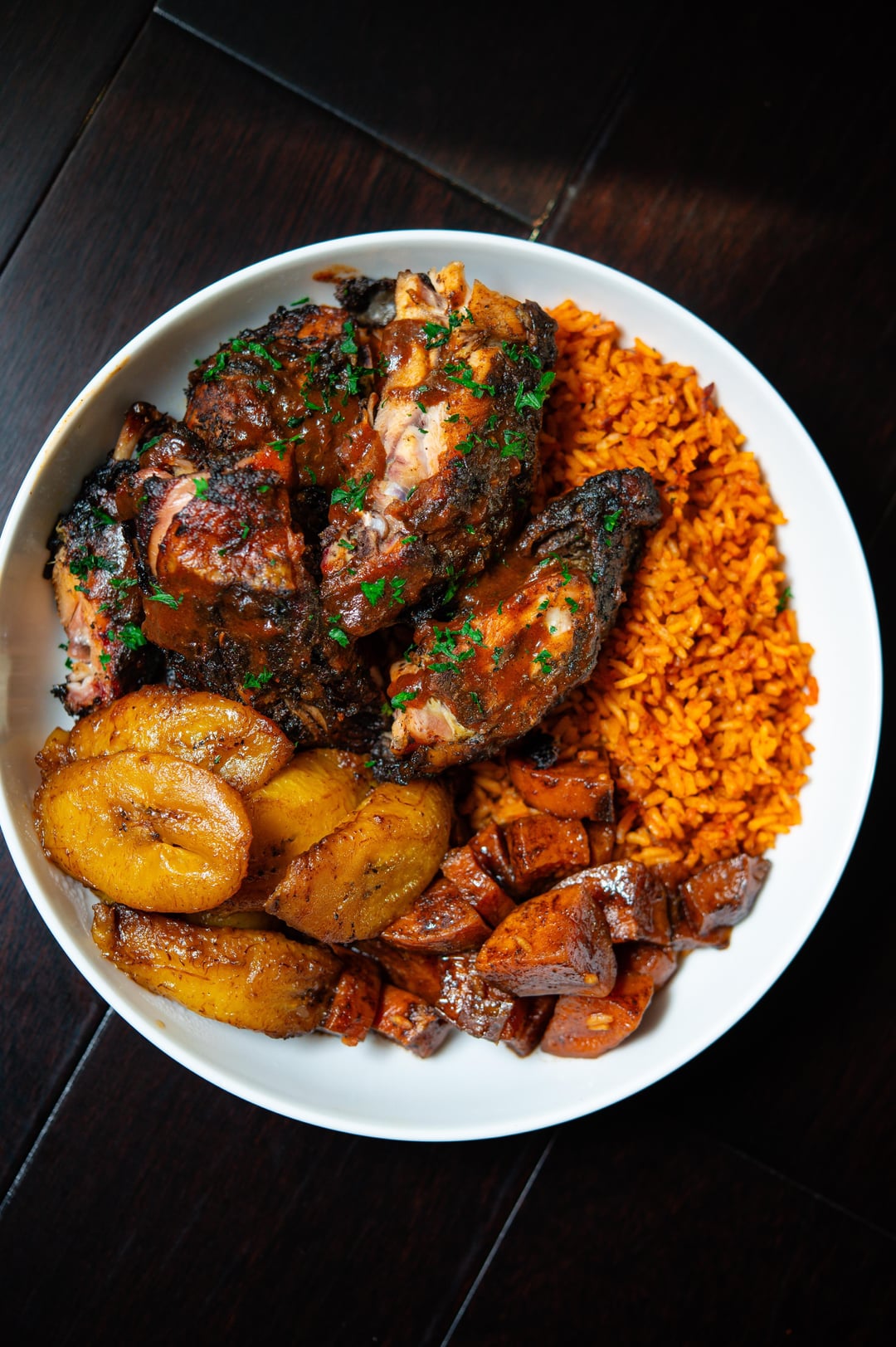 Smoked jerk chicken I made this weekend with jollof rice, candied yams ...