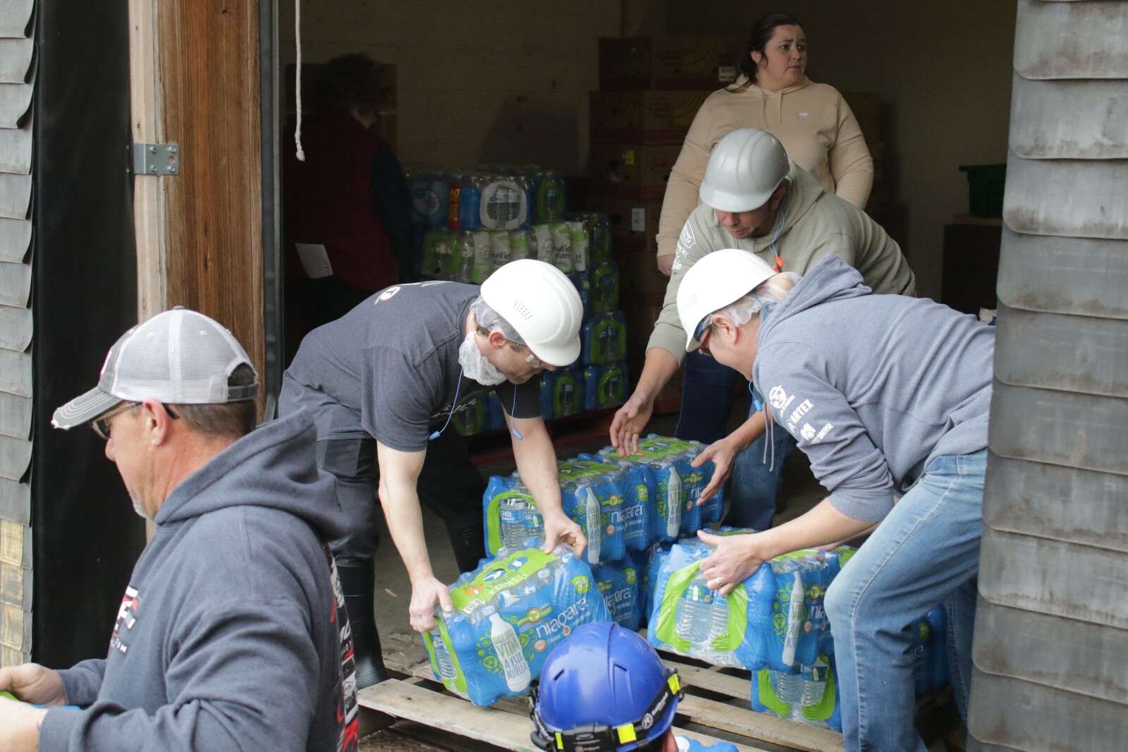 Performance Pet Products teamwork brings in pallets of food for ...