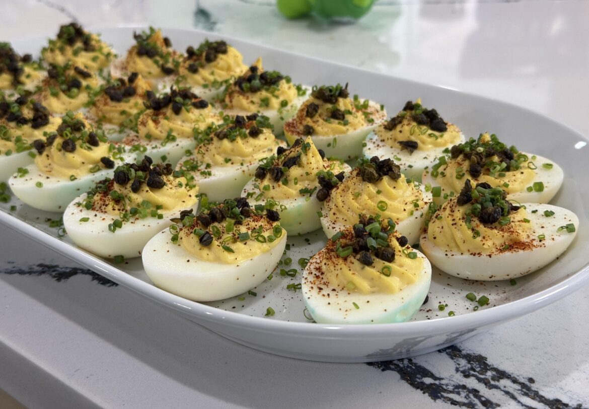 Roasted garlic deviled eggs with fried capers and chives. - Dining and Cooking