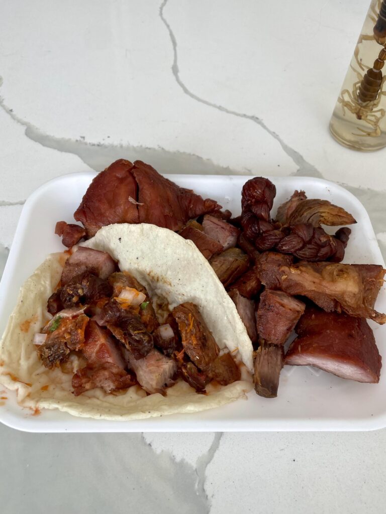 Tacos de Chicharron, Carnitas, & Tripa trenzada (braided tripe) with a ...