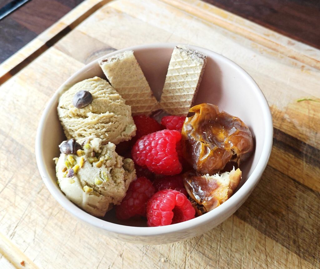 Raspberries, fresh dates, chocolate wafer and pistachio gelato with a ...