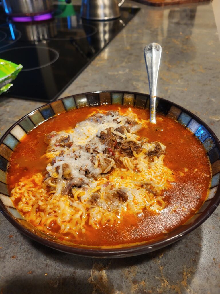 I made birria ramen with leftover birria, cheese and maruchan instant ...