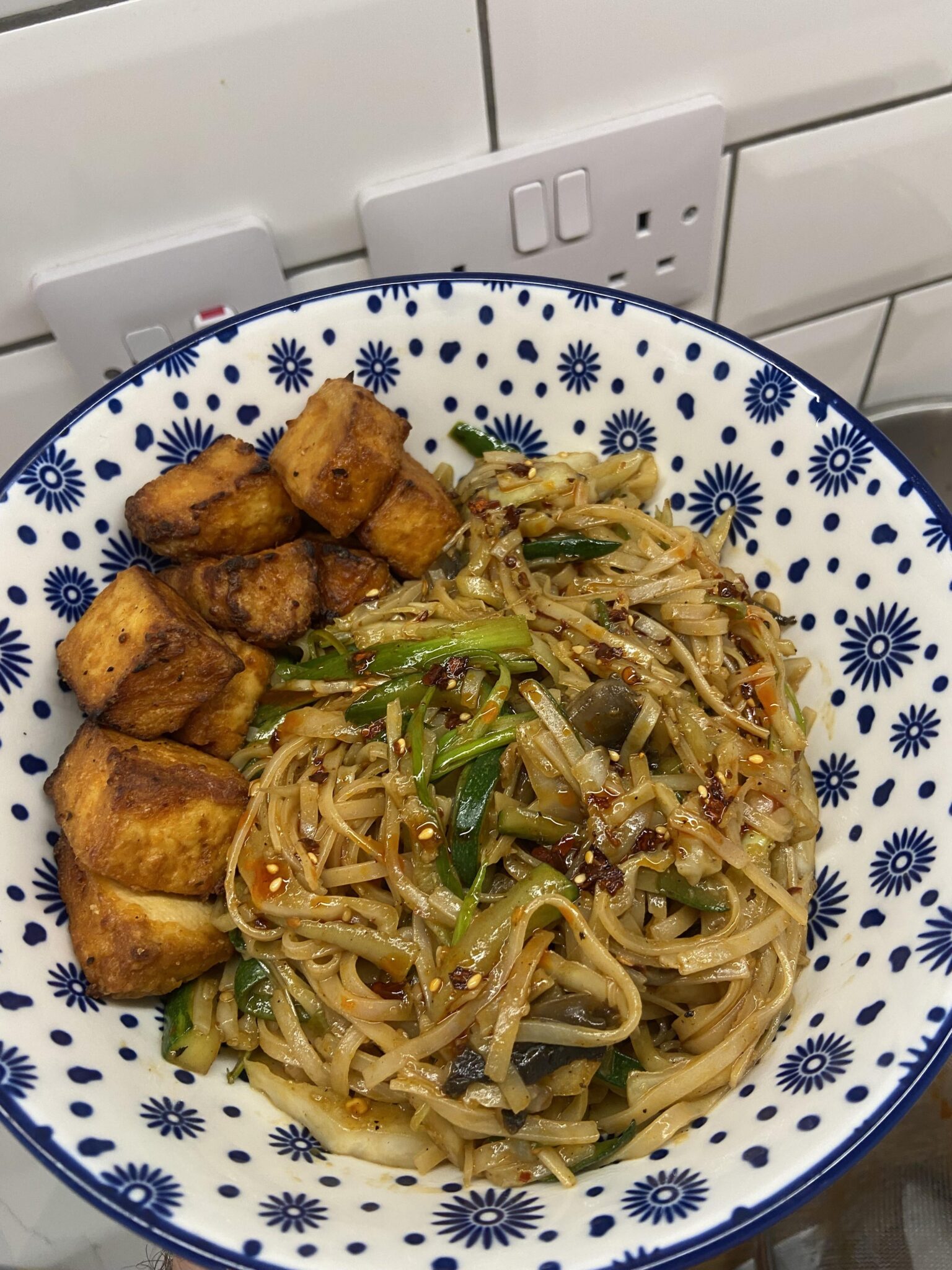 Stir fried chilli garlic noodles, with cabbage, courgette & mushroom ...