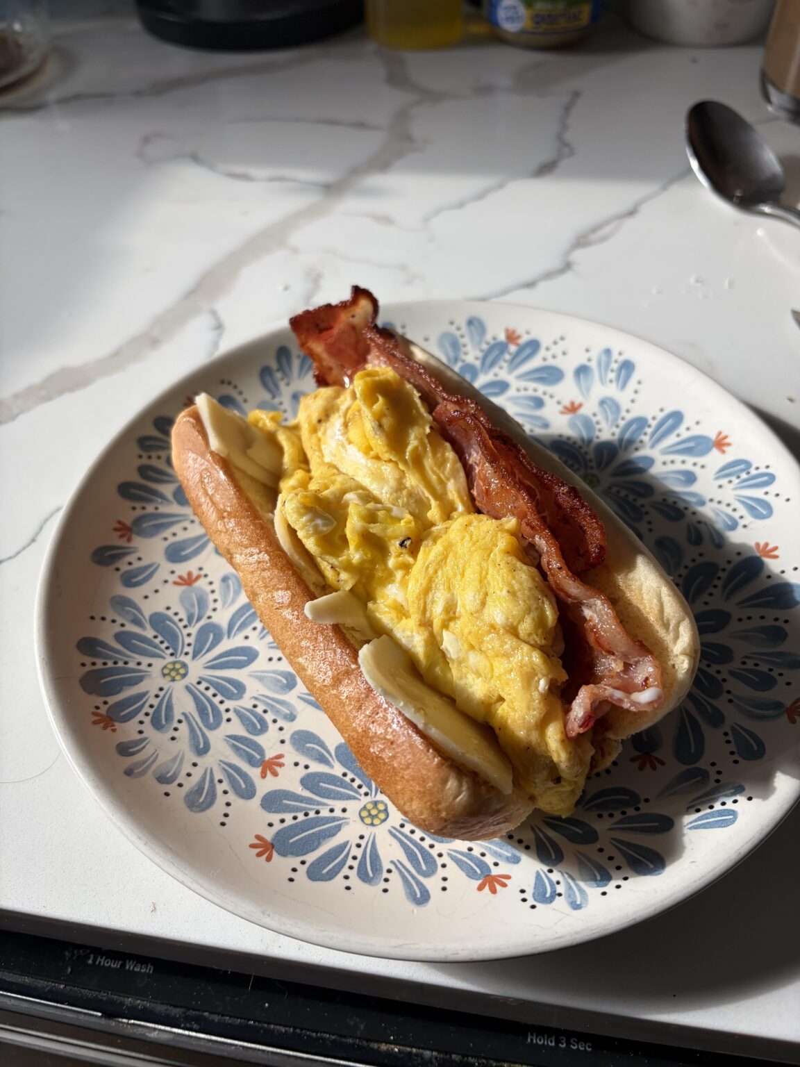 Bacon egg and cheese on a hot dog bun - Dining and Cooking