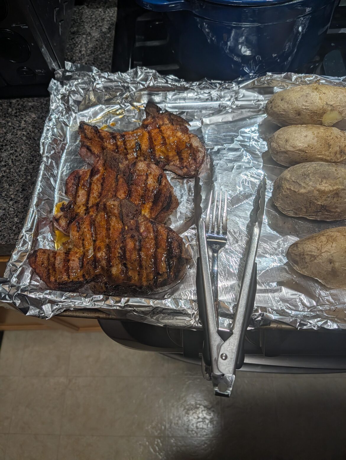 3 perfectly grilled bone in pork chops - Dining and Cooking